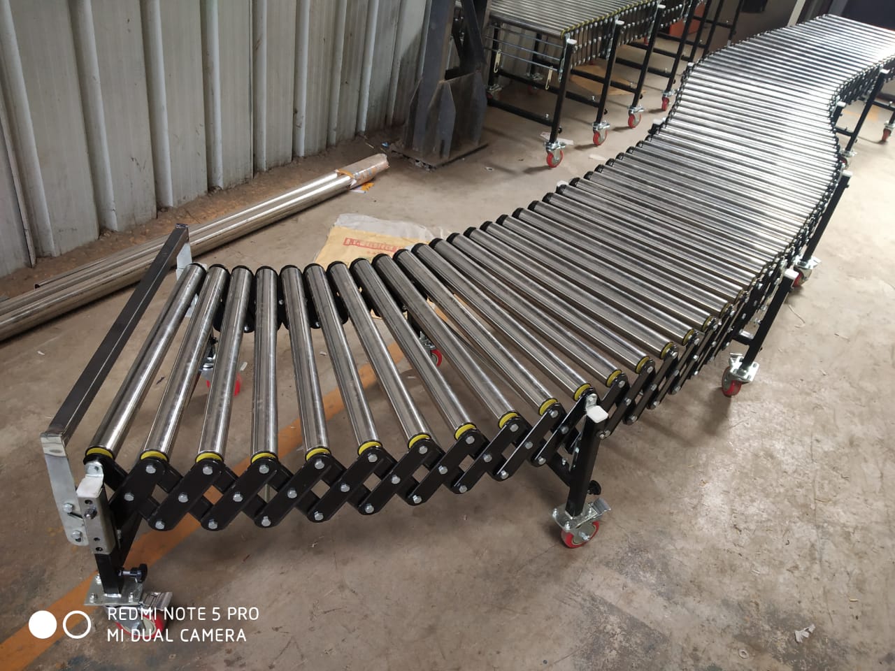 Flexible Roller Conveyor Machine Manufacturer & supplier
